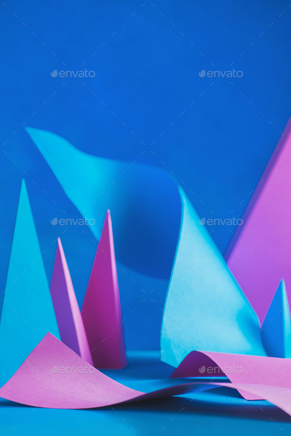 Papercraft shapes, pyramids, and curves in abstract paper sculpture ...