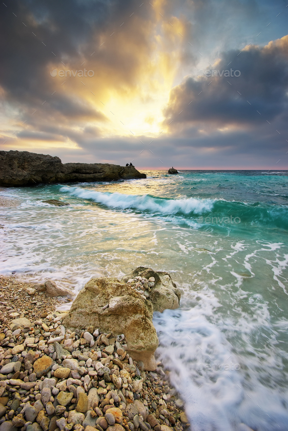 Sea and rock at the sunset. Stock Photo by rozum | PhotoDune