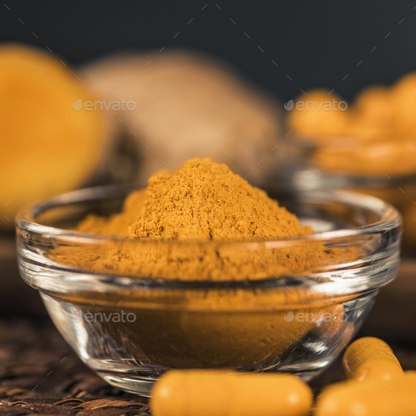 Turmeric Powder and Curcumin Herbal Supplement Capsules Stock Photo by ...