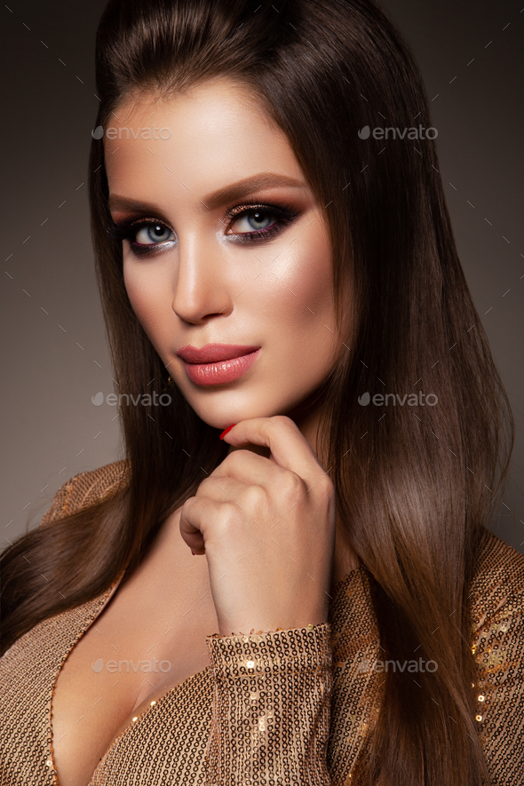 Beautiful woman with professional make up. Gold dress Stock Photo by ...