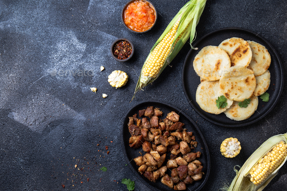 Colombian Food. Maize Arepas And Fried Pork Chicharon Stock Photo by ...