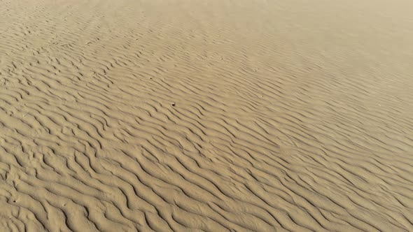 Parallel Sand Pattern Lines on Dune Surface in Desert, Stock Footage
