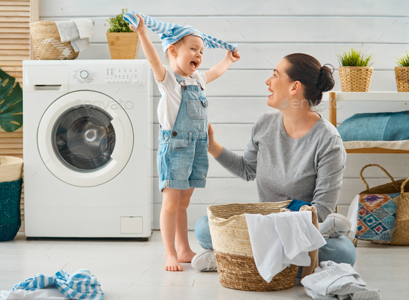 family doing laundry Stock Photo by choreograph | PhotoDune