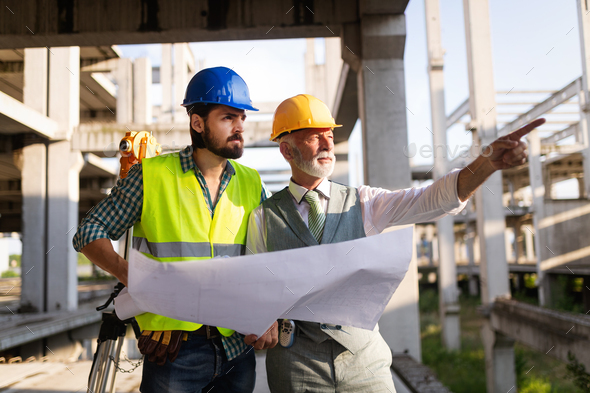 Group of construction engineer working in construction site Stock Photo ...