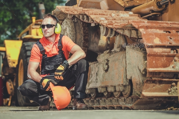Heavy Duty Equipment Mechanic Stock Photo by duallogic | PhotoDune