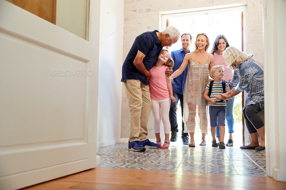 Multi Generation Family With Grandchildren Visiting Grandparents At ...