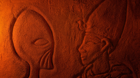 Carving Of Alien Being And Man In Dusty Tomb, Stock Footage | VideoHive