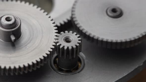 Gears rotating in a mechanical device. Machine metal gears rotating ...
