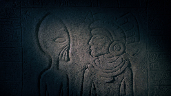 Torch Lights Up Carving Of Alien In Mayan Temple, Stock Footage | VideoHive