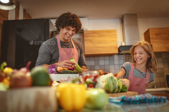 Teamwork In The Kitchen Stock Photo by micens | PhotoDune