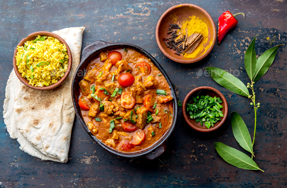 INDIAN FOOD. ROGAN JOSH curry sauce. Pork rogan josh with rice. Stock ...