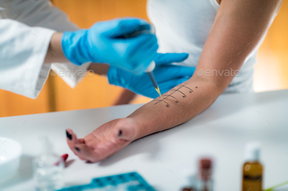 Immunology Doctor Measuring Allergic Reaction of Patient Stock Photo by ...