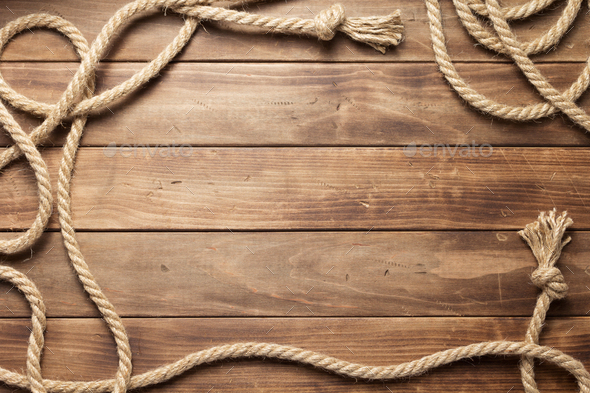 ship rope at wooden board background Stock Photo by seregam | PhotoDune
