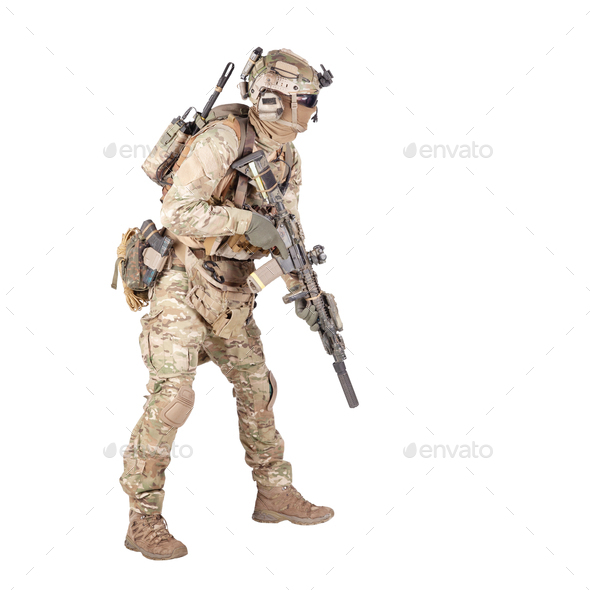 Army soldier crouching with rifle studio shoot Stock Photo by ...