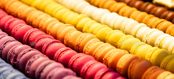 Macarons assortment background texture. Store showcase close up view ...