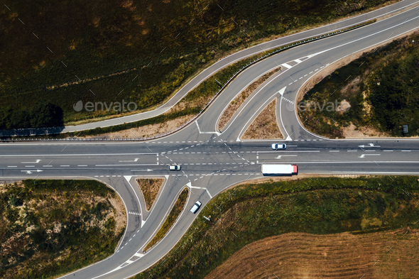 Aerial view of traffic on road intersection with turning lines Stock ...