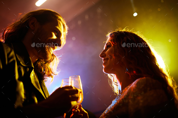 Young people getting acquainted in nightclub Stock Photo by ...