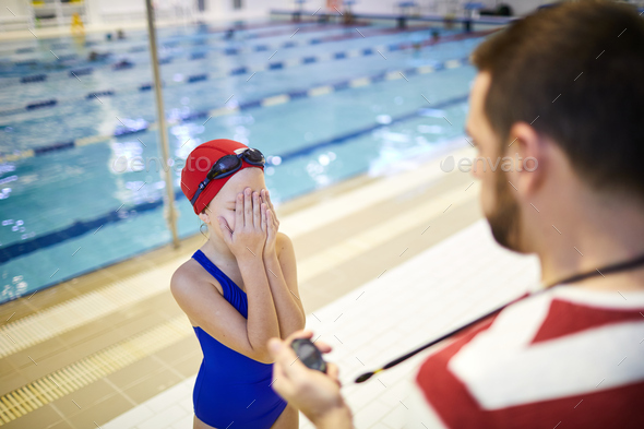 Sad athlete after the competition Stock Photo by seventyfourimages