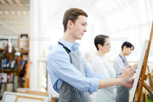Male Art Student Stock Photo by seventyfourimages | PhotoDune