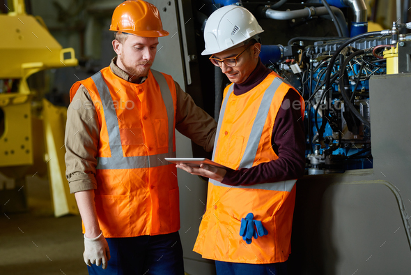 Modern Factory Workers at Plant Stock Photo by seventyfourimages ...