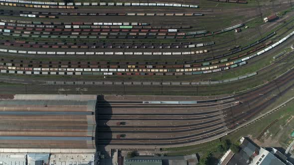 Train Station with Freight Trains and Containers in Aerial View. Aerial ...