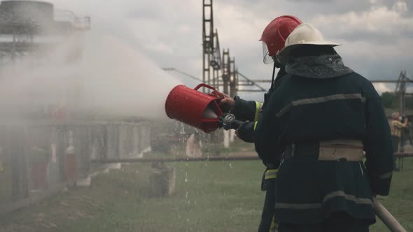 Instructor Teaching Fireman to Extinguish Fire, Stock Footage | VideoHive
