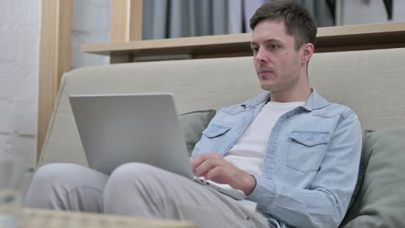 Young Man Closing Laptop and Leaving Room, Stock Footage | VideoHive