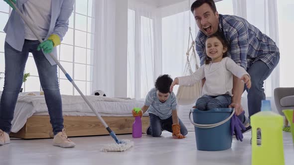 Joyful Dad Riding Daughter on Bucket During Clean, Stock Footage ...