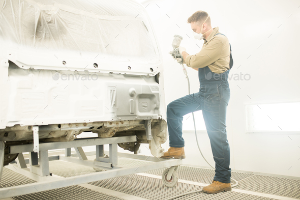 Mechanic Painting Car Body Stock Photo by seventyfourimages | PhotoDune