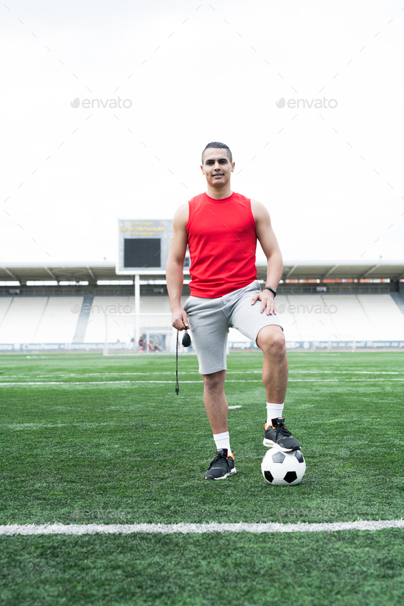 Football Coach Posing in Stadium Stock Photo by seventyfourimages ...