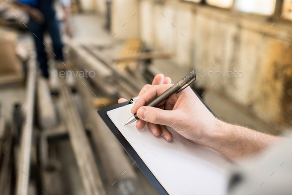 Quality control of manufacturing items Stock Photo by seventyfourimages