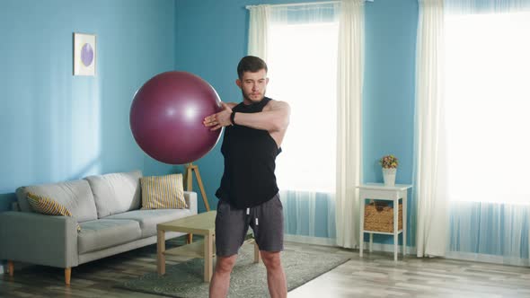 Athletic Man Is Doing Upper Body Rotation Exercise, Stock Footage ...