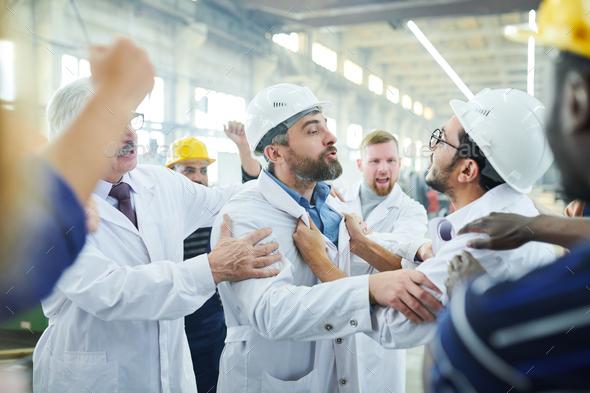 Factory Workers Fighting Stock Photo by seventyfourimages | PhotoDune