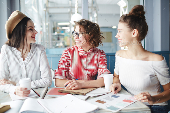 Girls having discussion Stock Photo by Pressmaster | PhotoDune