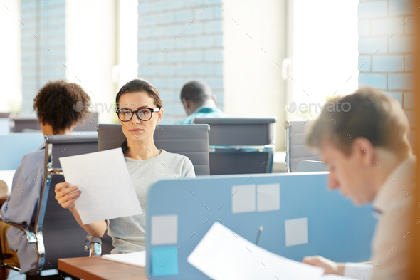 Employee with paper Stock Photo by Pressmaster | PhotoDune