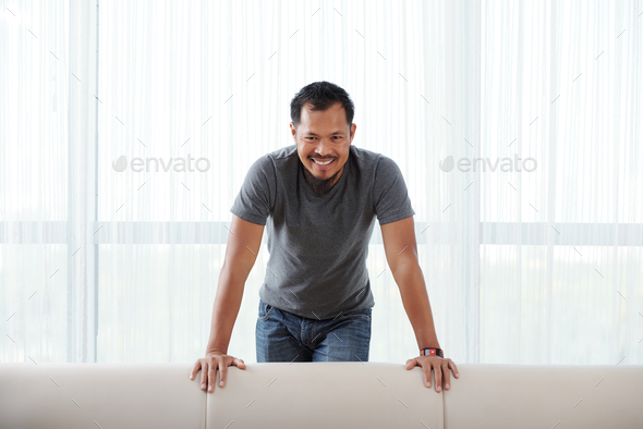 Grinning man Stock Photo by DragonImages | PhotoDune