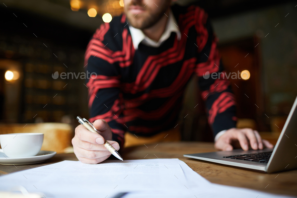 Man with pen Stock Photo by Pressmaster | PhotoDune