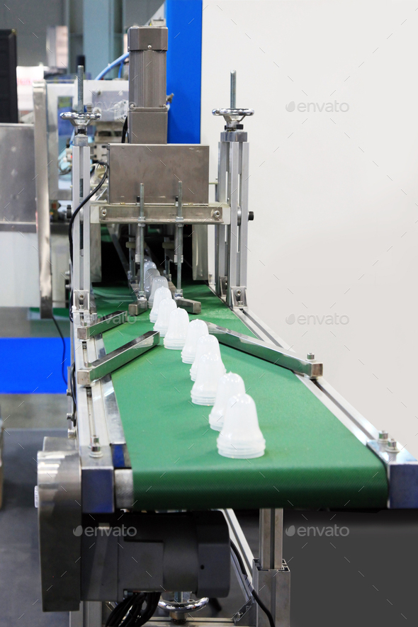 conveyor with preform Stock Photo by ssp48 | PhotoDune