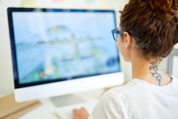 Designer in front of monitor Stock Photo by Pressmaster | PhotoDune