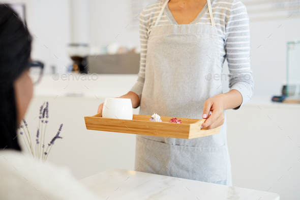 Bringing dessert and drink Stock Photo by Pressmaster | PhotoDune