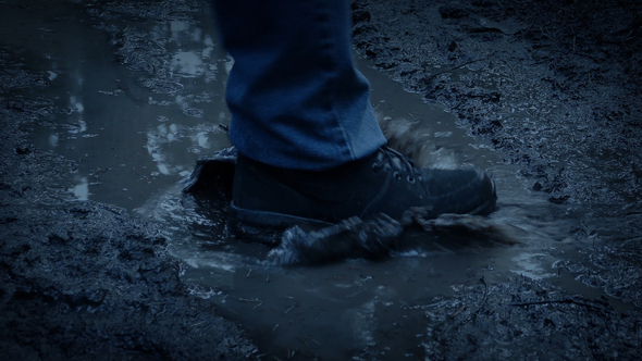 Boot Splashes In Puddle In Forest At Dusk, Stock Footage | VideoHive