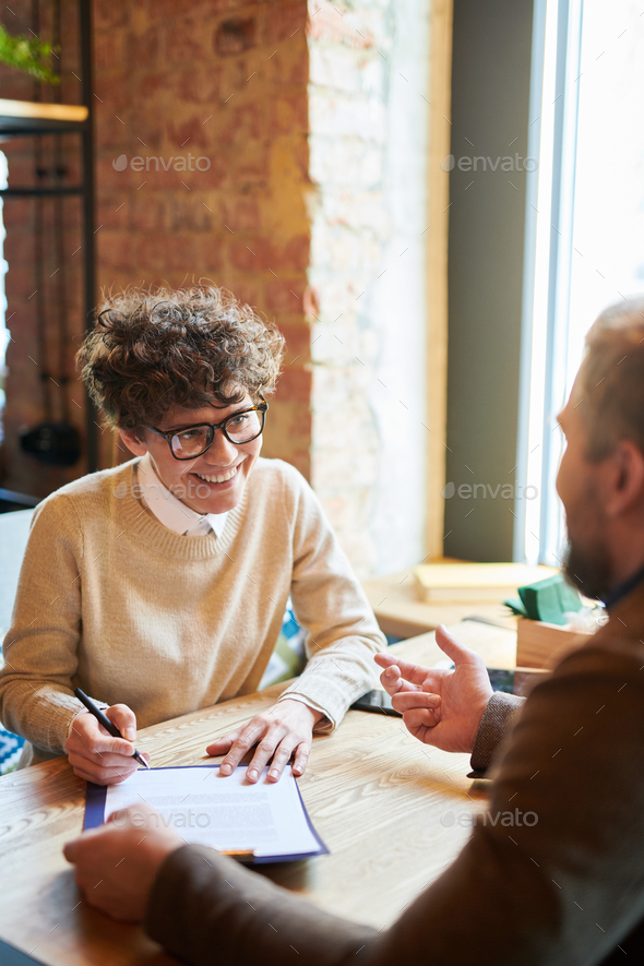 Signing paper Stock Photo by Pressmaster | PhotoDune