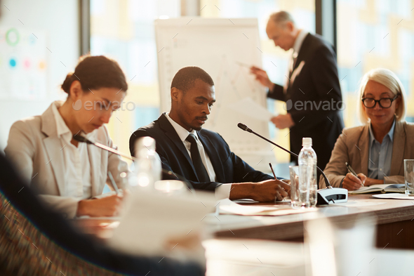 Writing down plans Stock Photo by Pressmaster | PhotoDune
