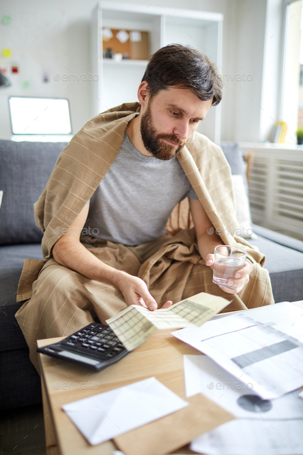 Looking through documents Stock Photo by Pressmaster | PhotoDune