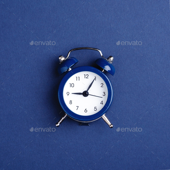 Blue Alarm Clock on Dark Blue Background. Stock Photo by fucsiya ...