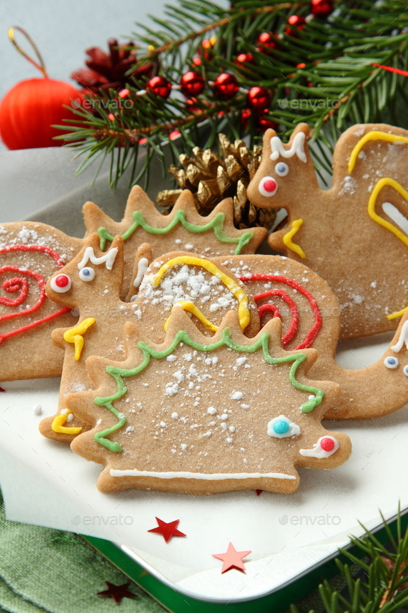 Christmas animal-shaped cookies with festive decorations Stock Photo by ...