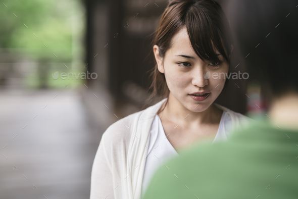 two young japanese woman talking Stock Photo by jpozzi | PhotoDune