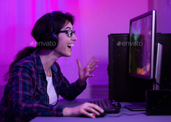 Won game. Girl playing online game on computer Stock Photo by Prostock ...