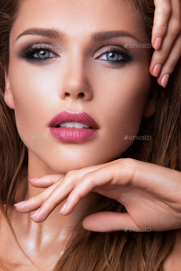 Make up. Glamour portrait of beautiful woman model with fresh makeup ...