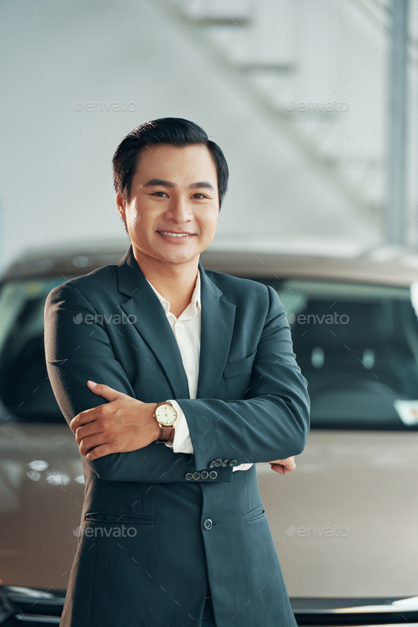 Car dealership owner Stock Photo by DragonImages | PhotoDune